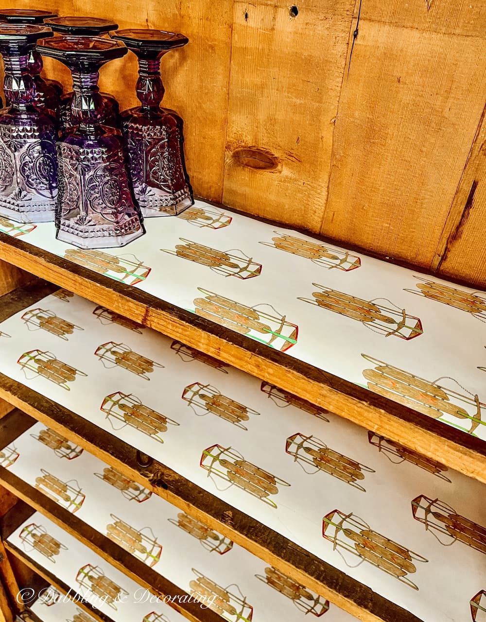 DIY Shelf Liners with Wrapping Paper | A Vintage Ski Lodge Styling Tip