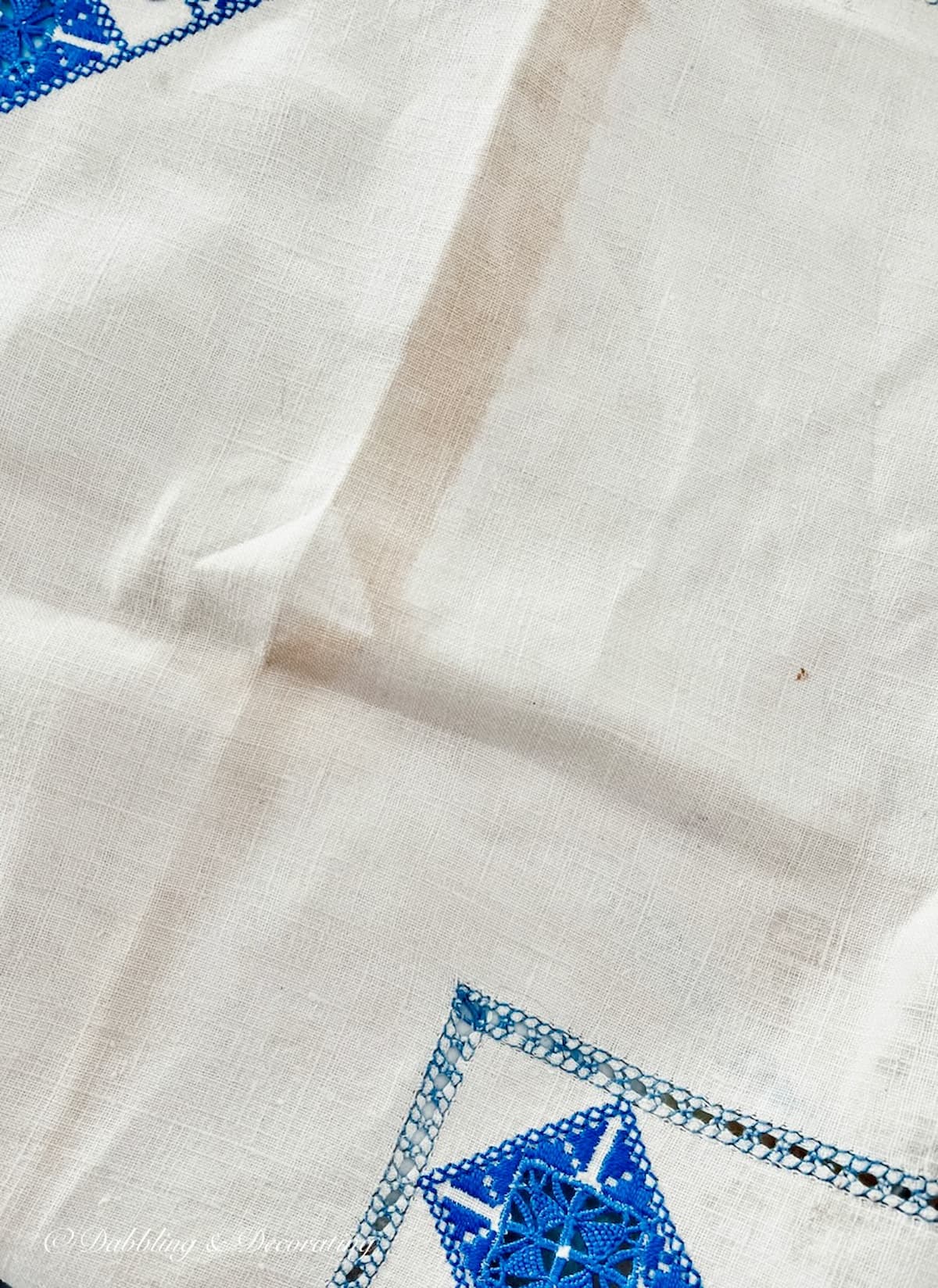 How to Safely Bring Age Stained Textiles Back to Life